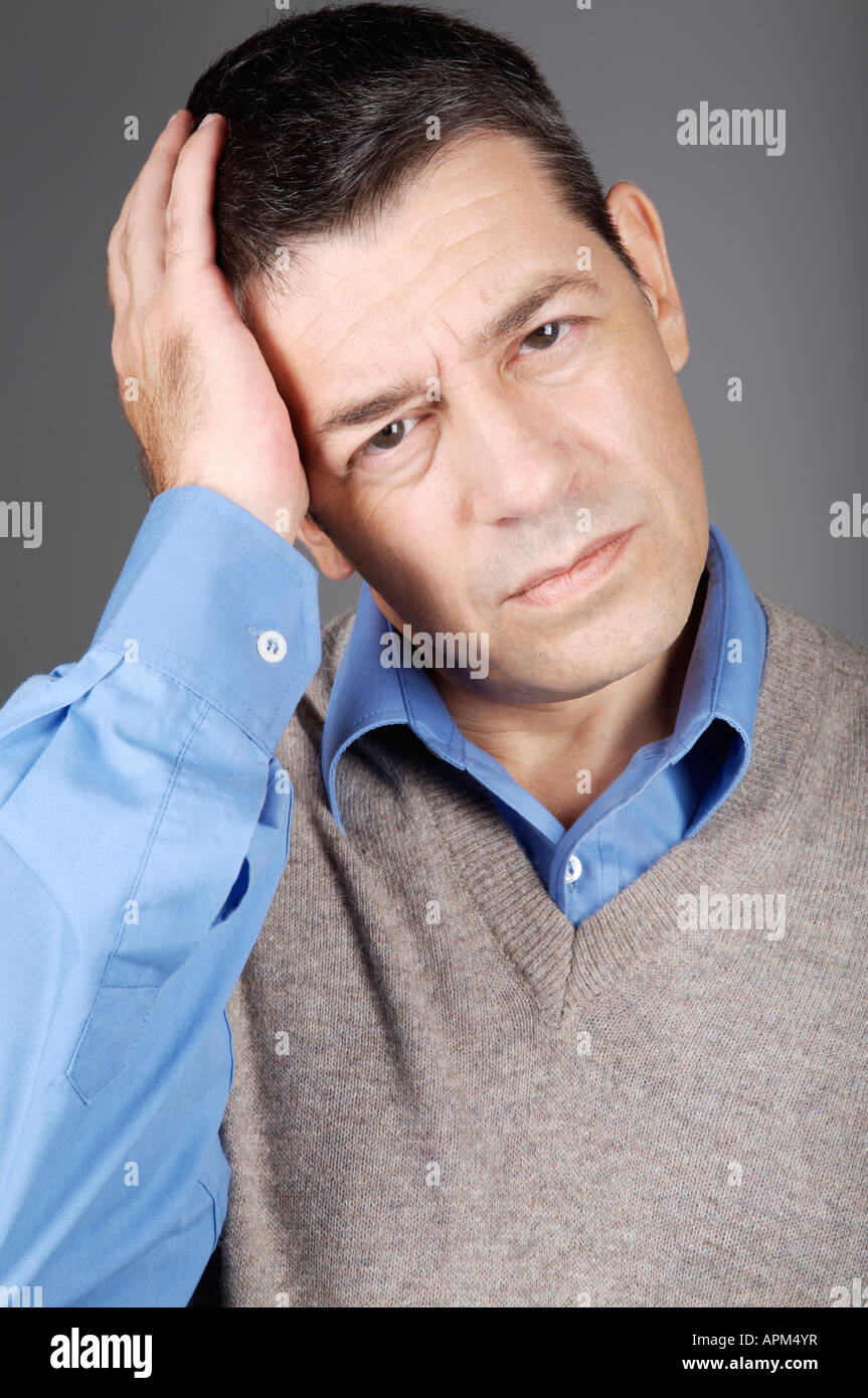 Studio portrait of a man, expressions Stock Photo - Alamy