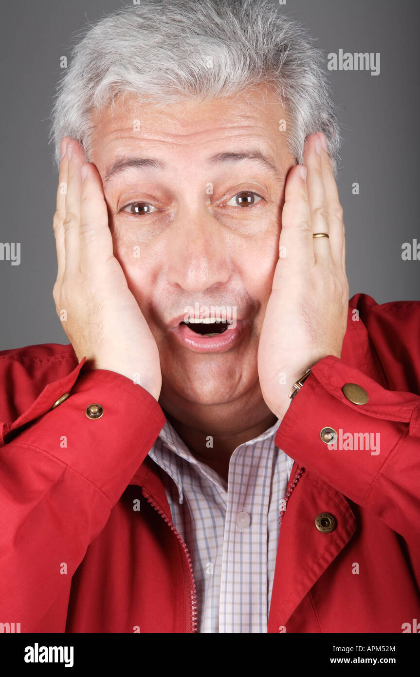 Studio portrait of a man, expressions Stock Photo - Alamy
