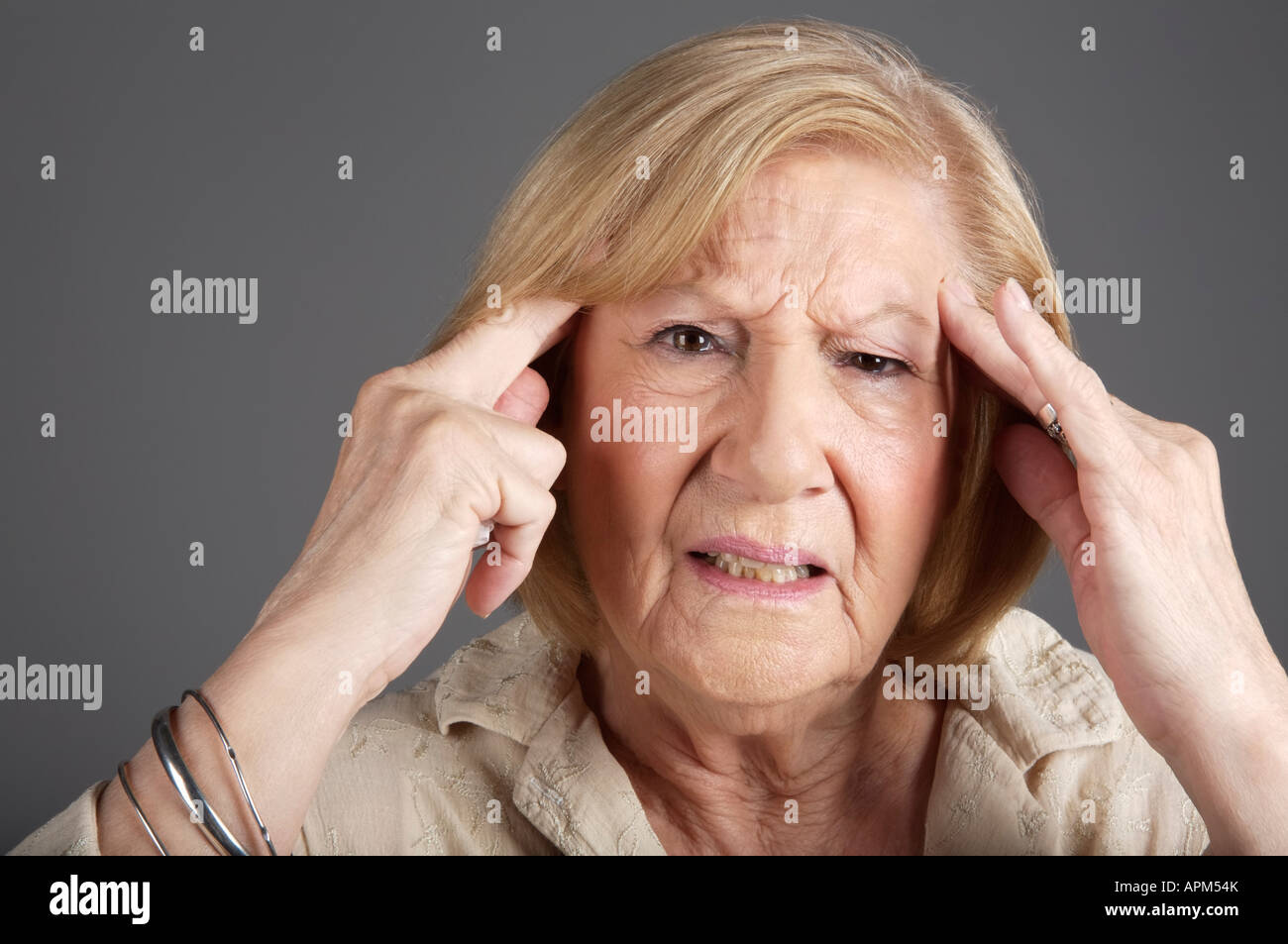 Studio portrait of a woman, expressions Stock Photo - Alamy