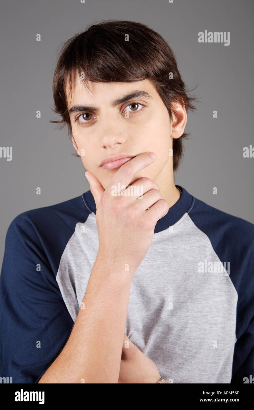 Teenage boy, studio portrait Stock Photo - Alamy