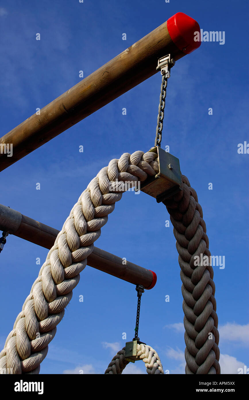 rope of a merry-go-round in an infantile park a clear and sunny day ...