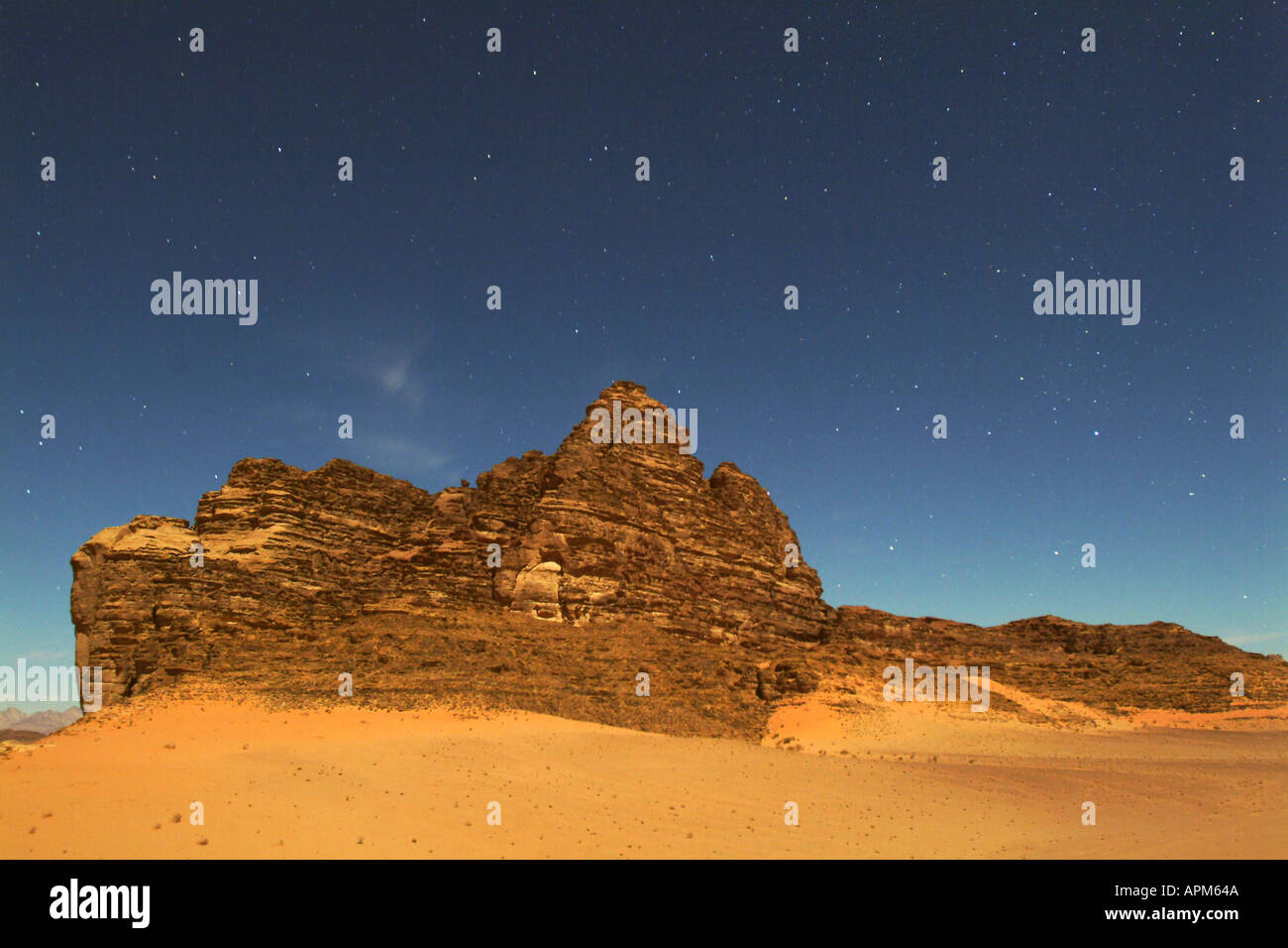 Wadi Rum under full moon Jordan Stock Photo - Alamy
