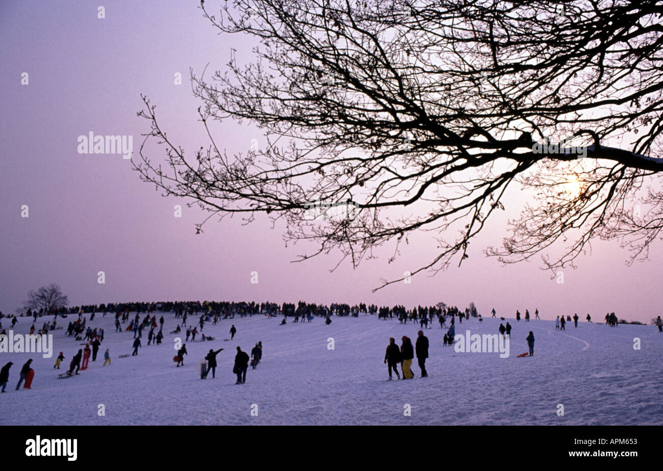 Late afternoon winter scene with snow on Hampstead Heath London Stock ...