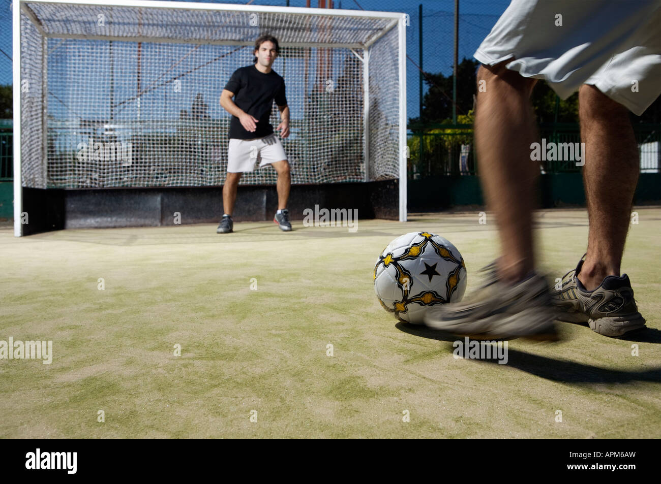 Two boys stand football hi-res stock photography and images - Alamy