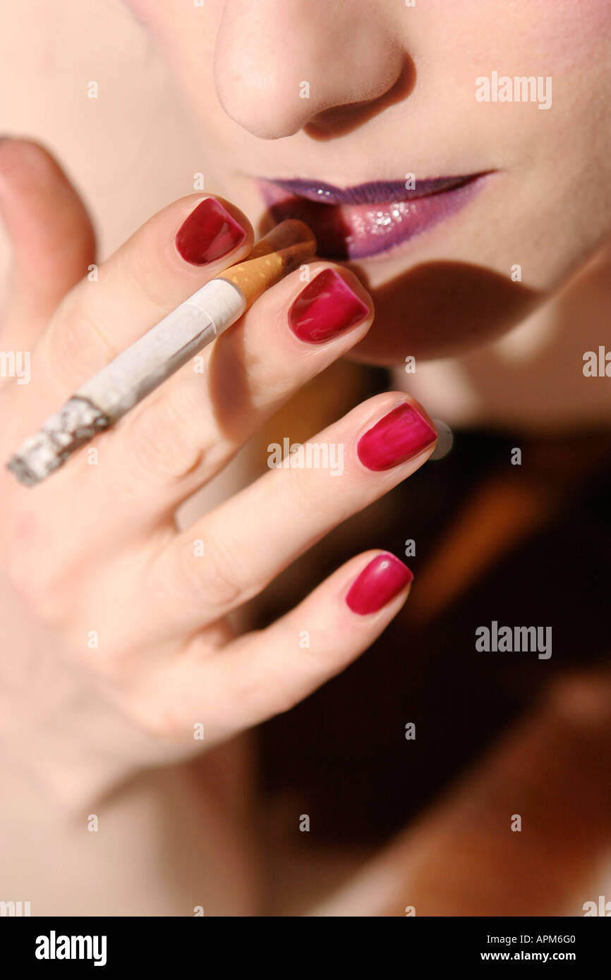 Woman lipstick smoking hi-res stock photography and images - Alamy