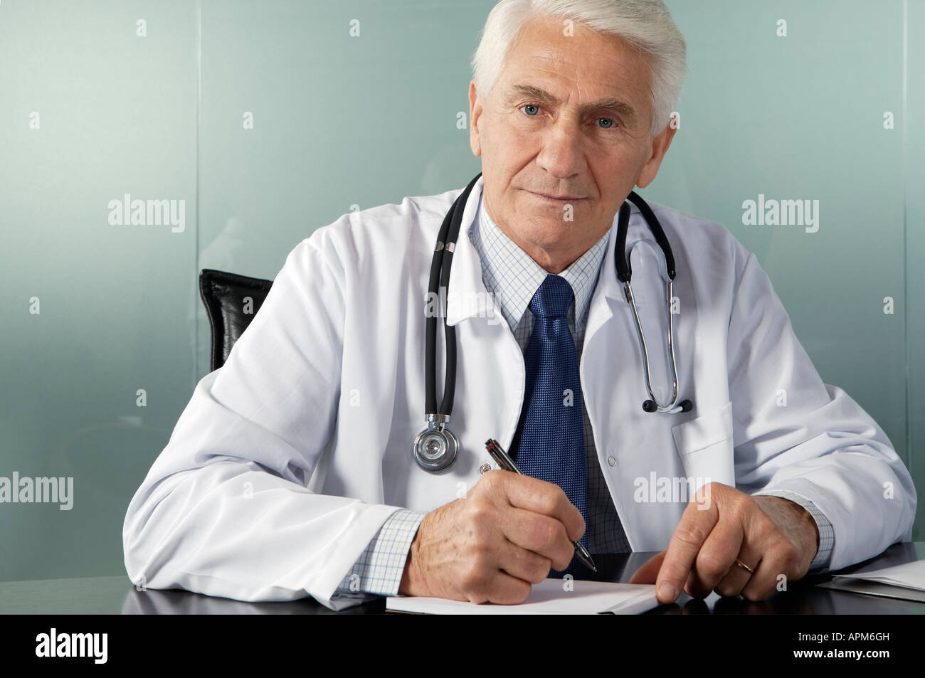 Doctor in office Stock Photo - Alamy