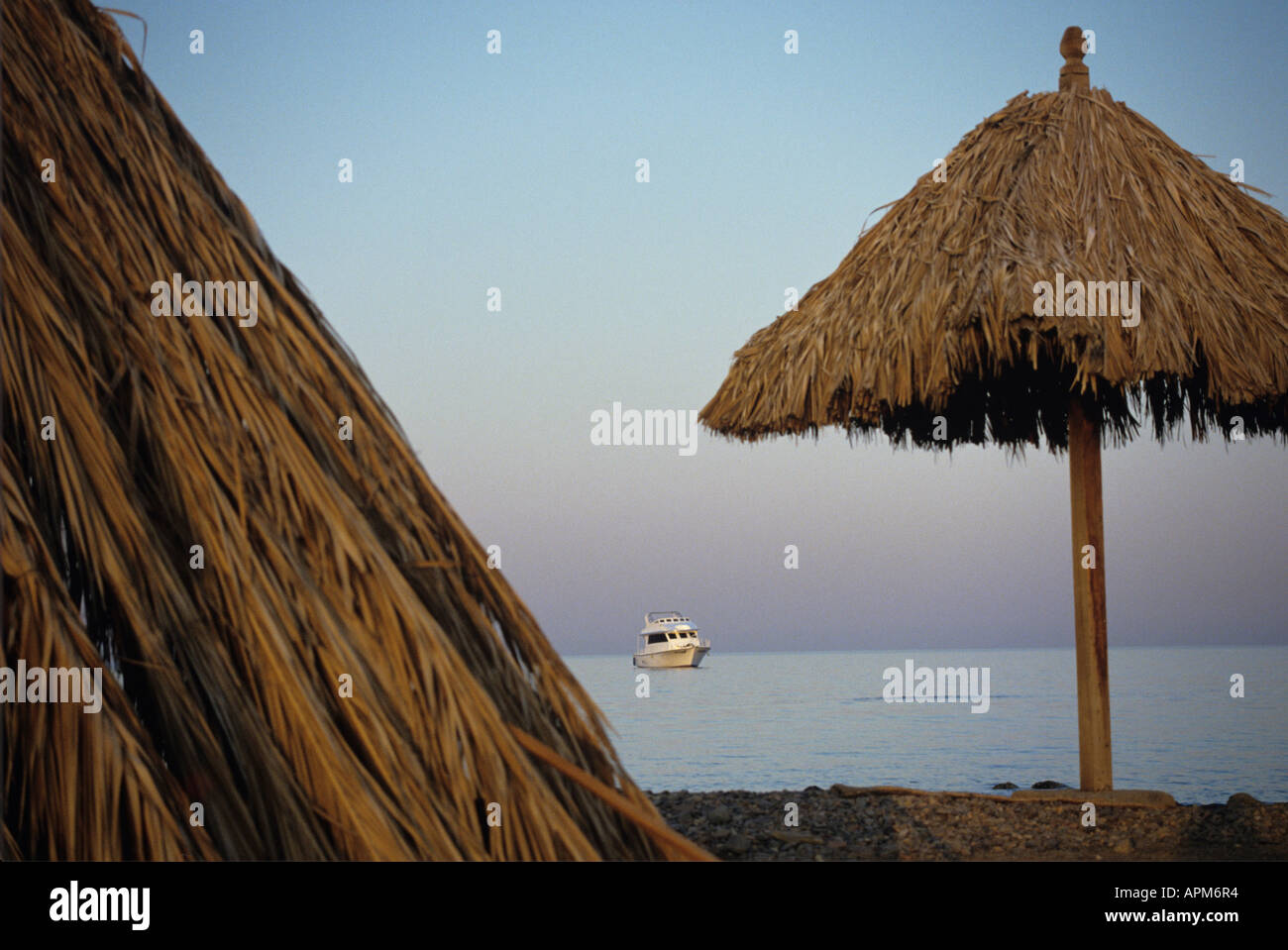 Egypt, Safaga, Thatch on the sandy beach Stock Photo - Alamy