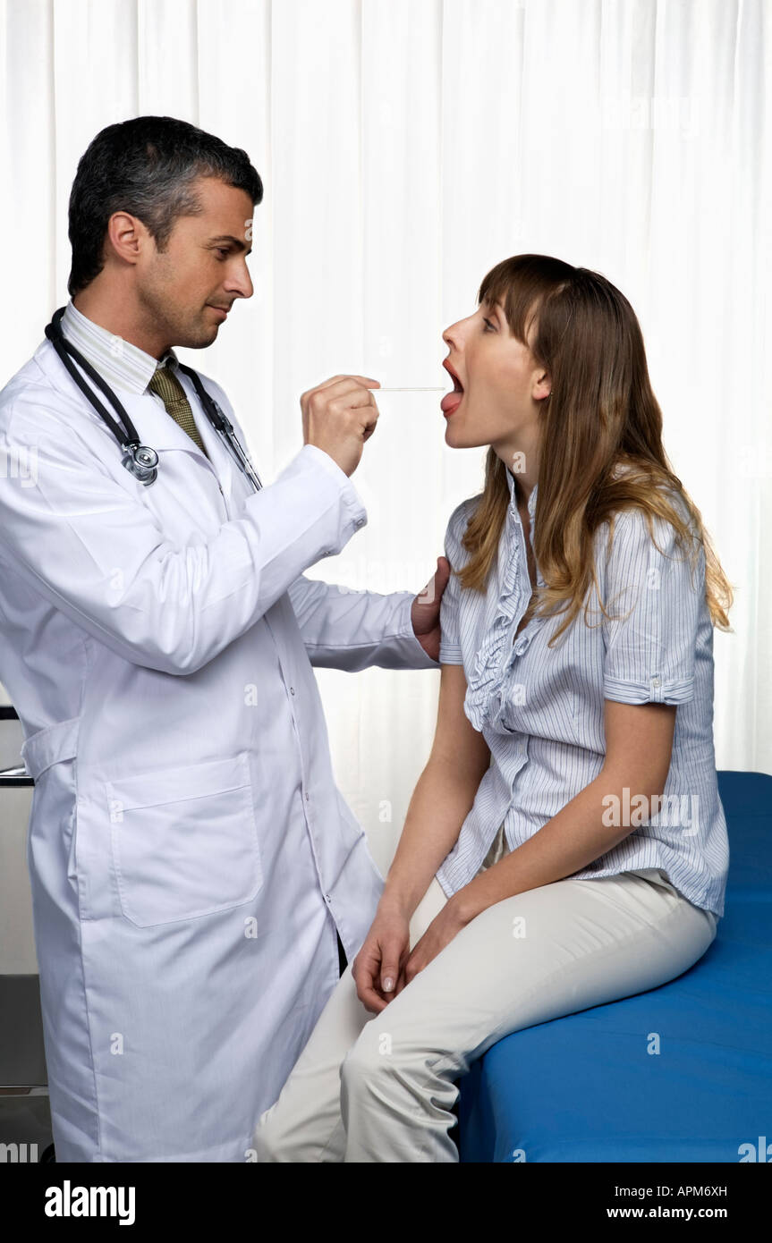 Doctor and patient at box Stock Photo - Alamy