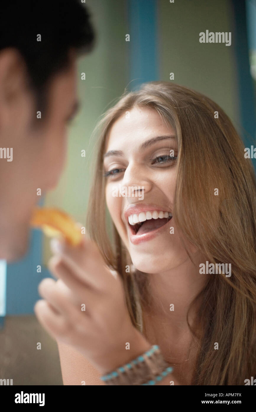 Young man giving cookies hi-res stock photography and images - Alamy