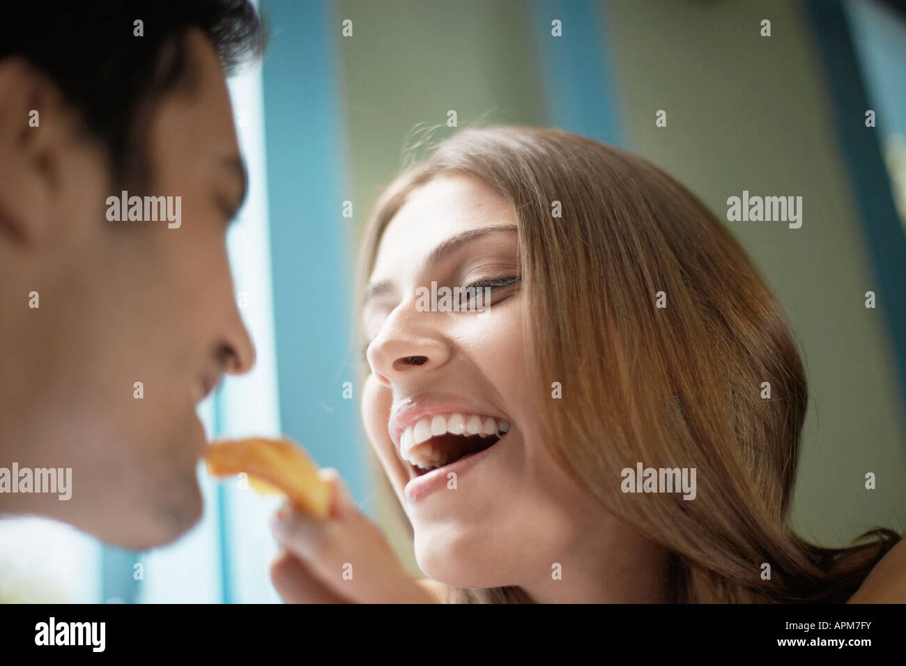 Man biting cookie hi-res stock photography and images - Alamy