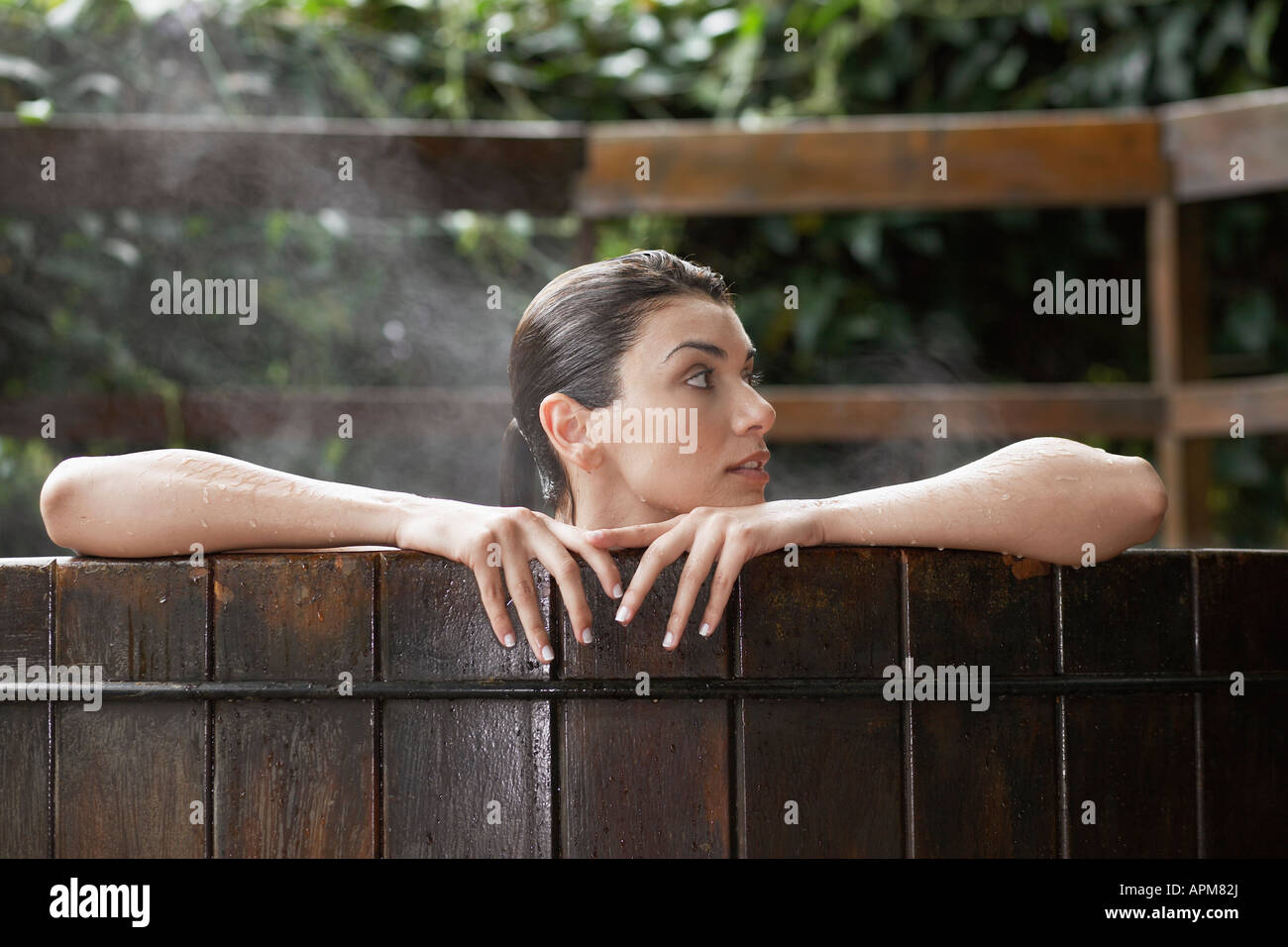 Young woman in Jacuzzi Stock Photo - Alamy