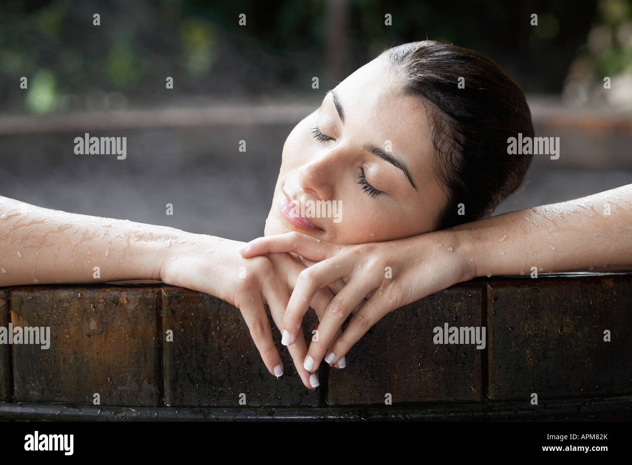 Young woman in Jacuzzi Stock Photo - Alamy