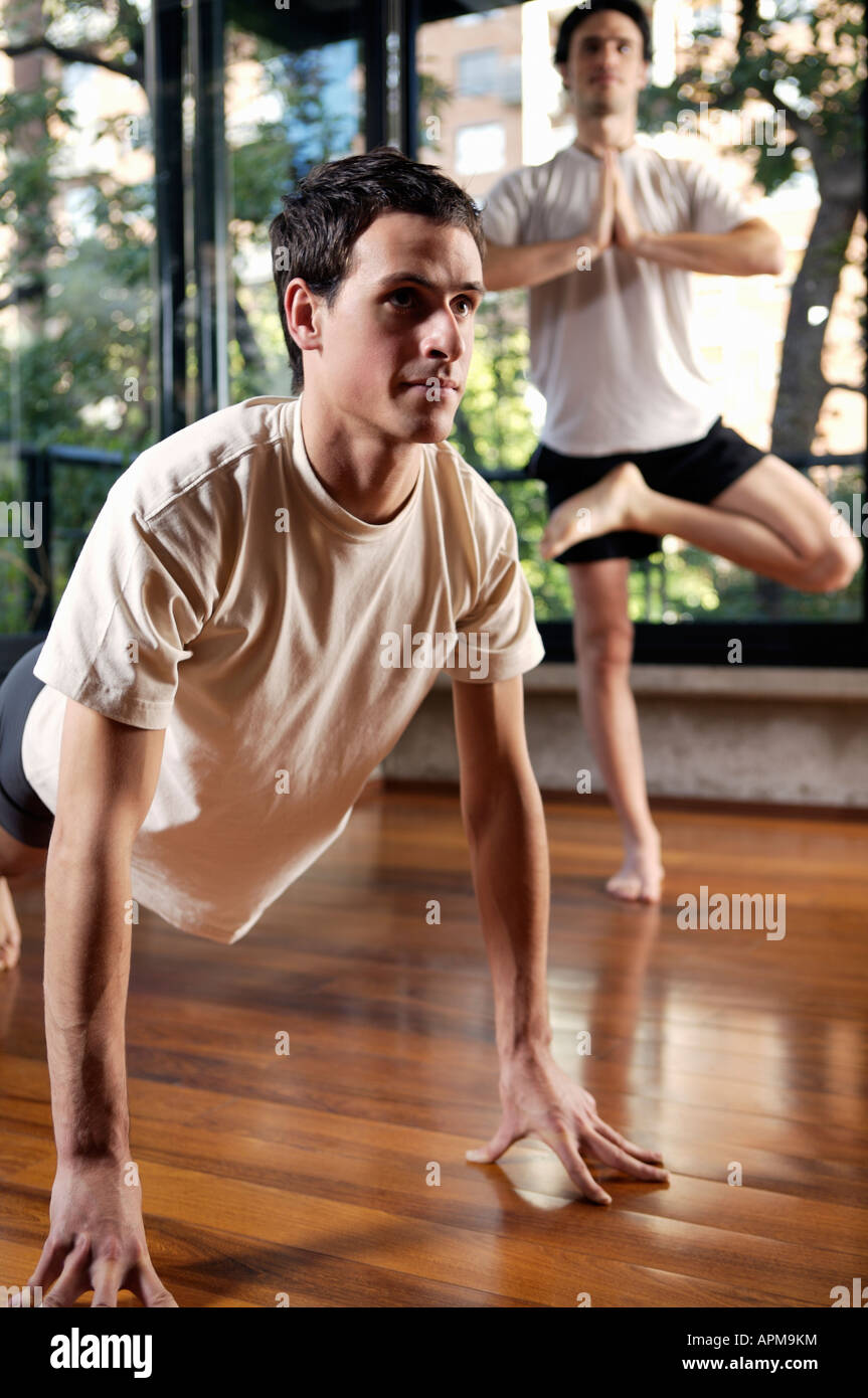 Men practicing yoga Stock Photo - Alamy