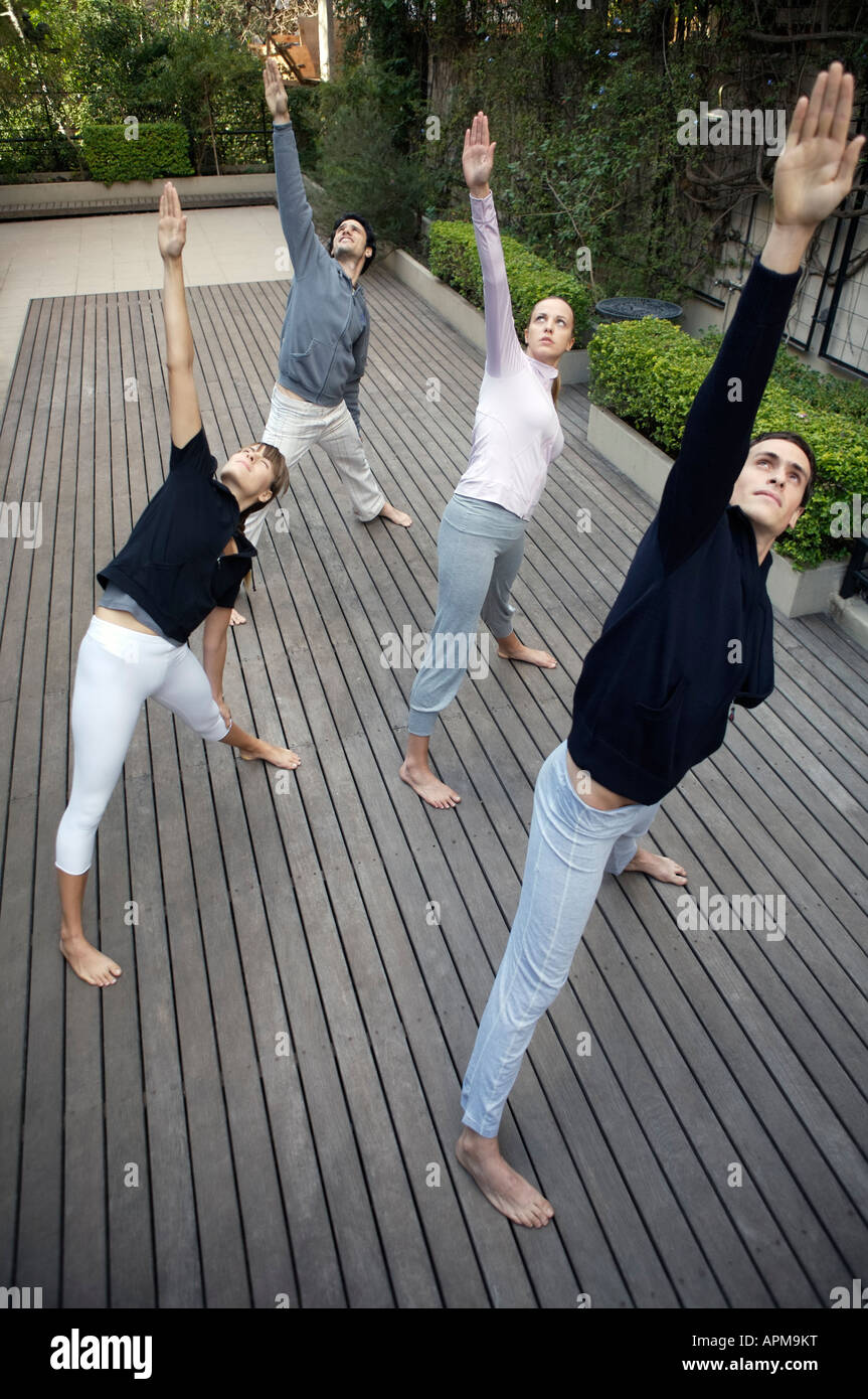 People practicing yoga Stock Photo - Alamy