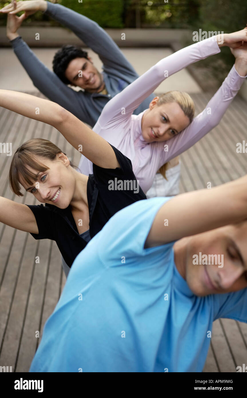 People practicing yoga Stock Photo - Alamy