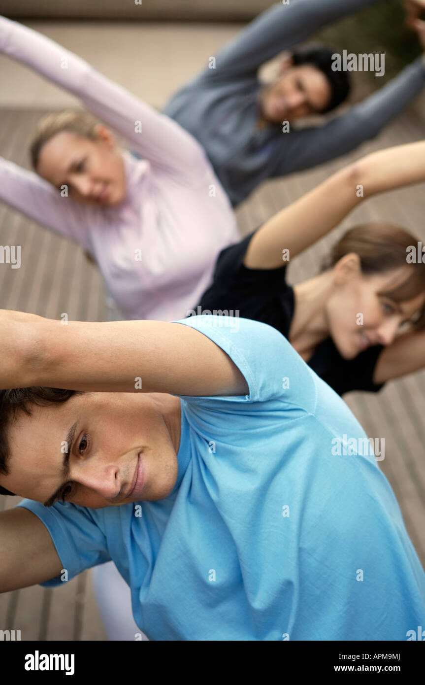 People practicing yoga Stock Photo - Alamy