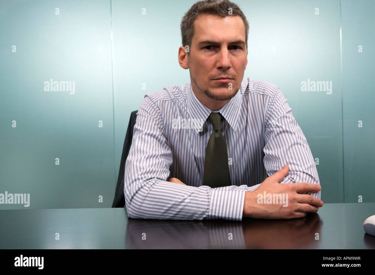 Portrait of serious business man Stock Photo - Alamy