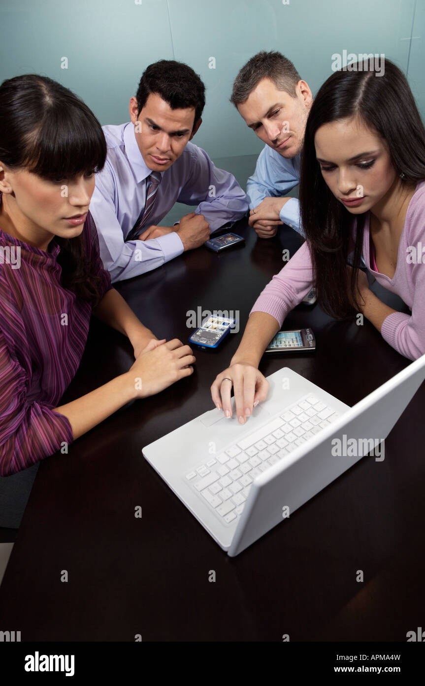 Office meeting everybody looking computer hi-res stock photography and ...