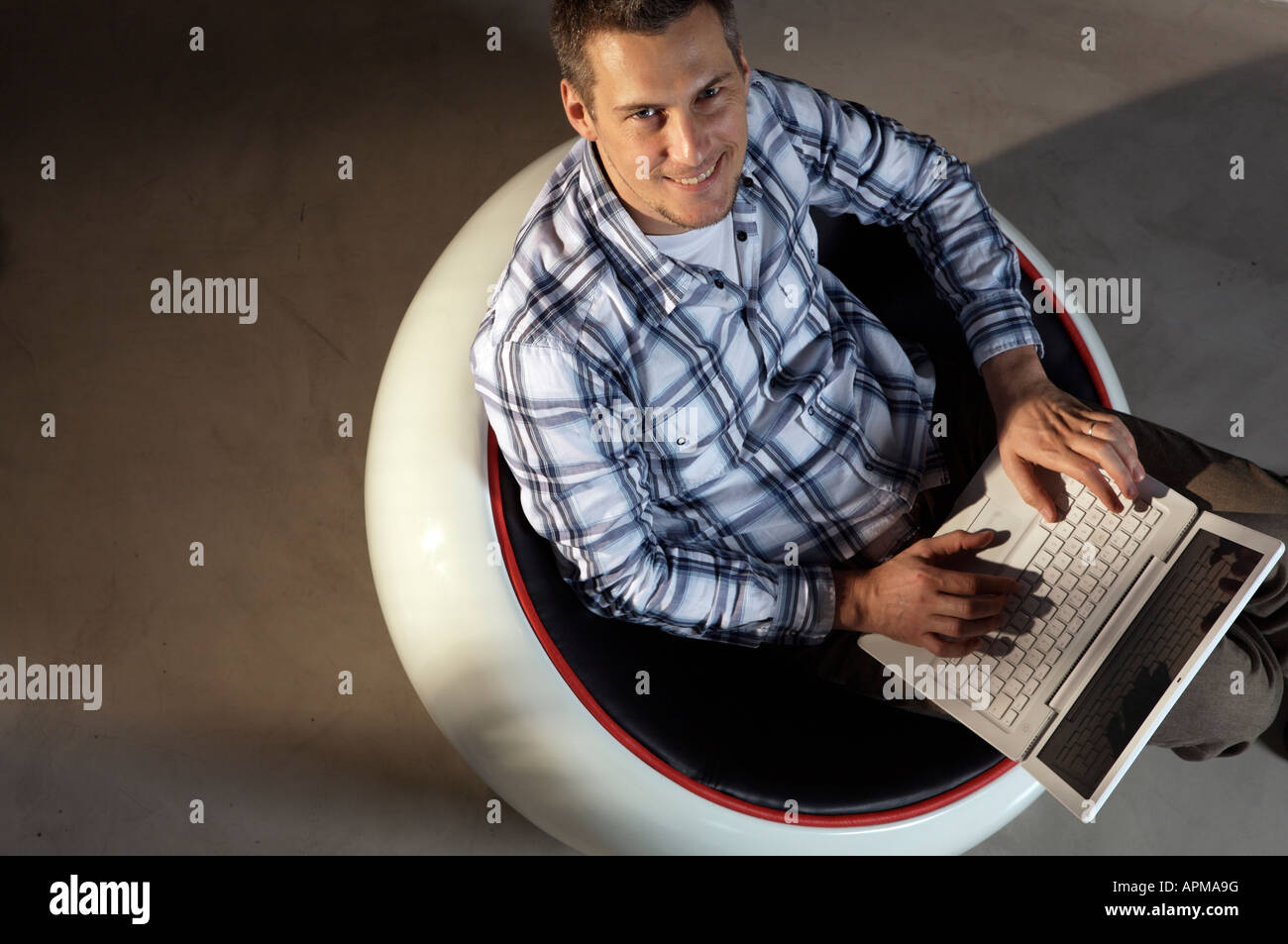 Man with laptop Stock Photo - Alamy