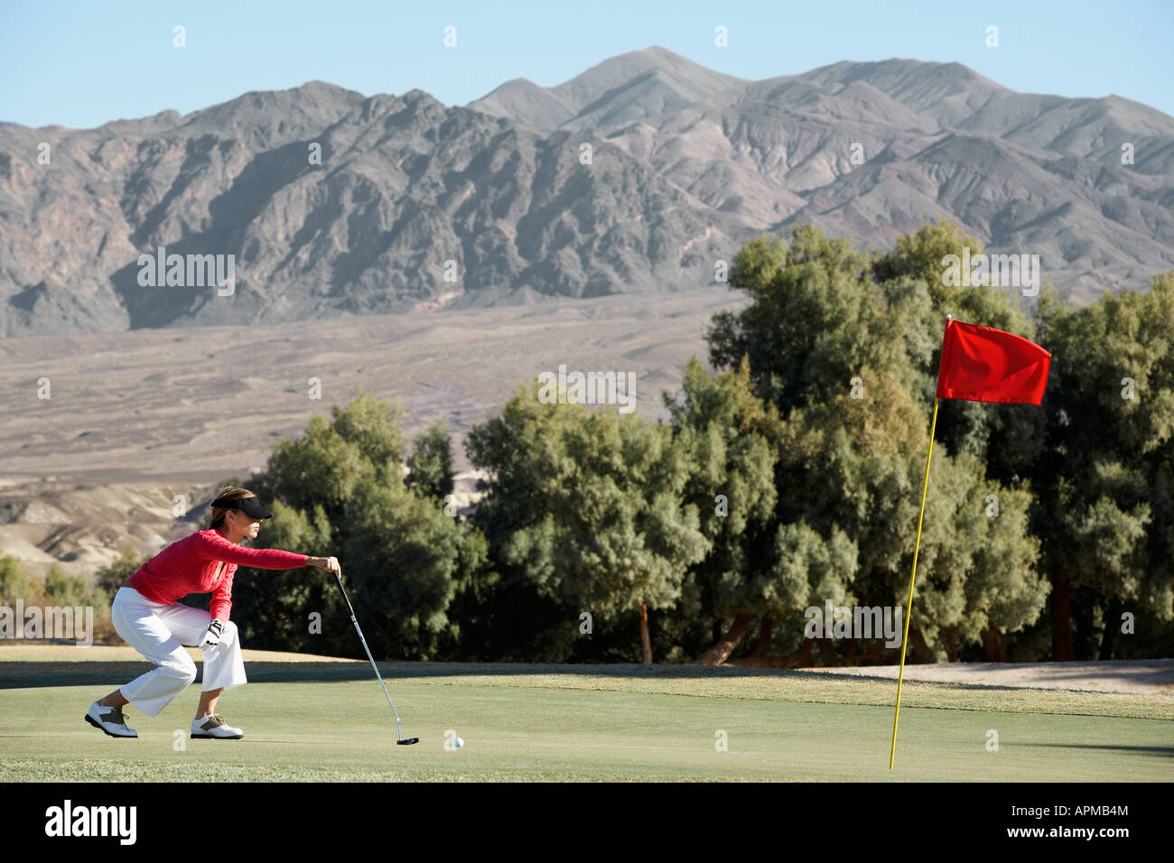 Full length putt hi-res stock photography and images - Alamy