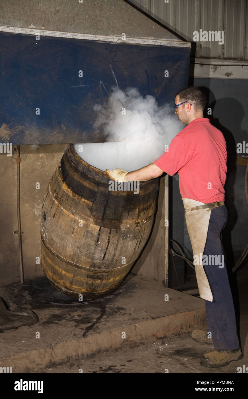 Whiskey process Barrel cleaning & storage, Employee Steaming whisky ...