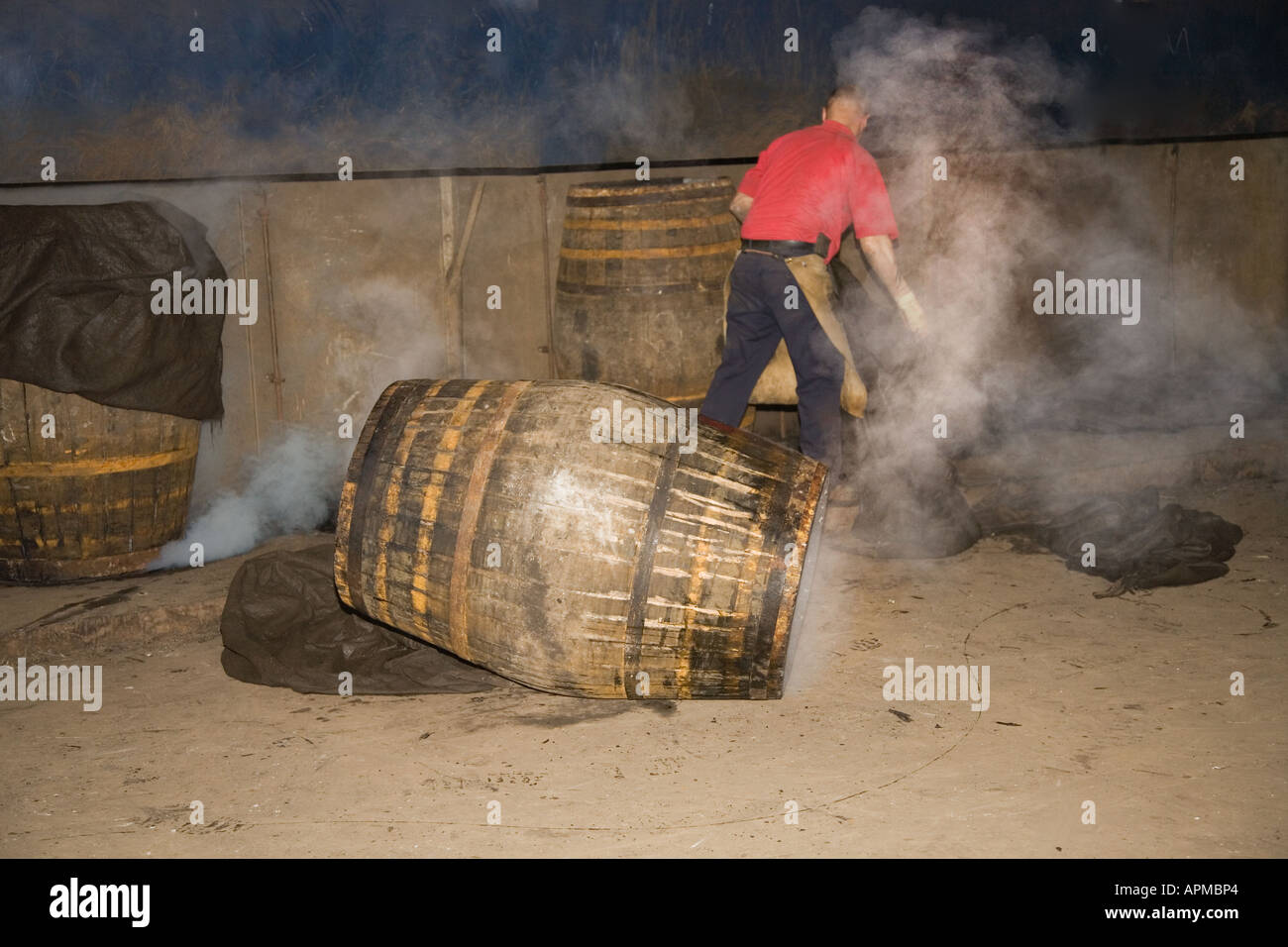 Whiskey process Barrel cleaning & storage, Employee Steaming whisky ...