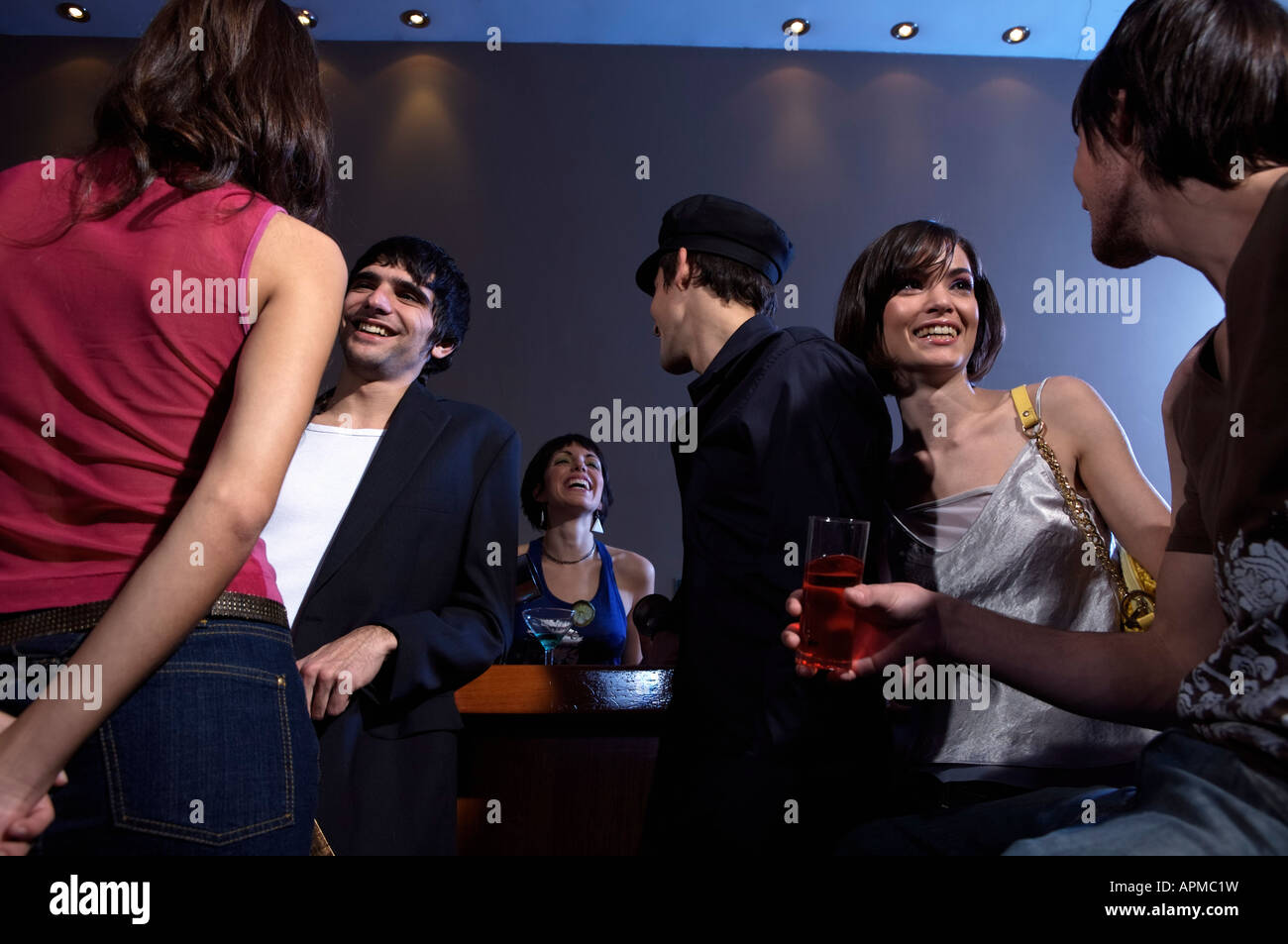Group of people in a bar Stock Photo - Alamy