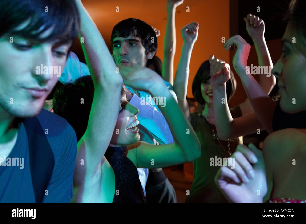Group of people dancing in a bar Stock Photo - Alamy