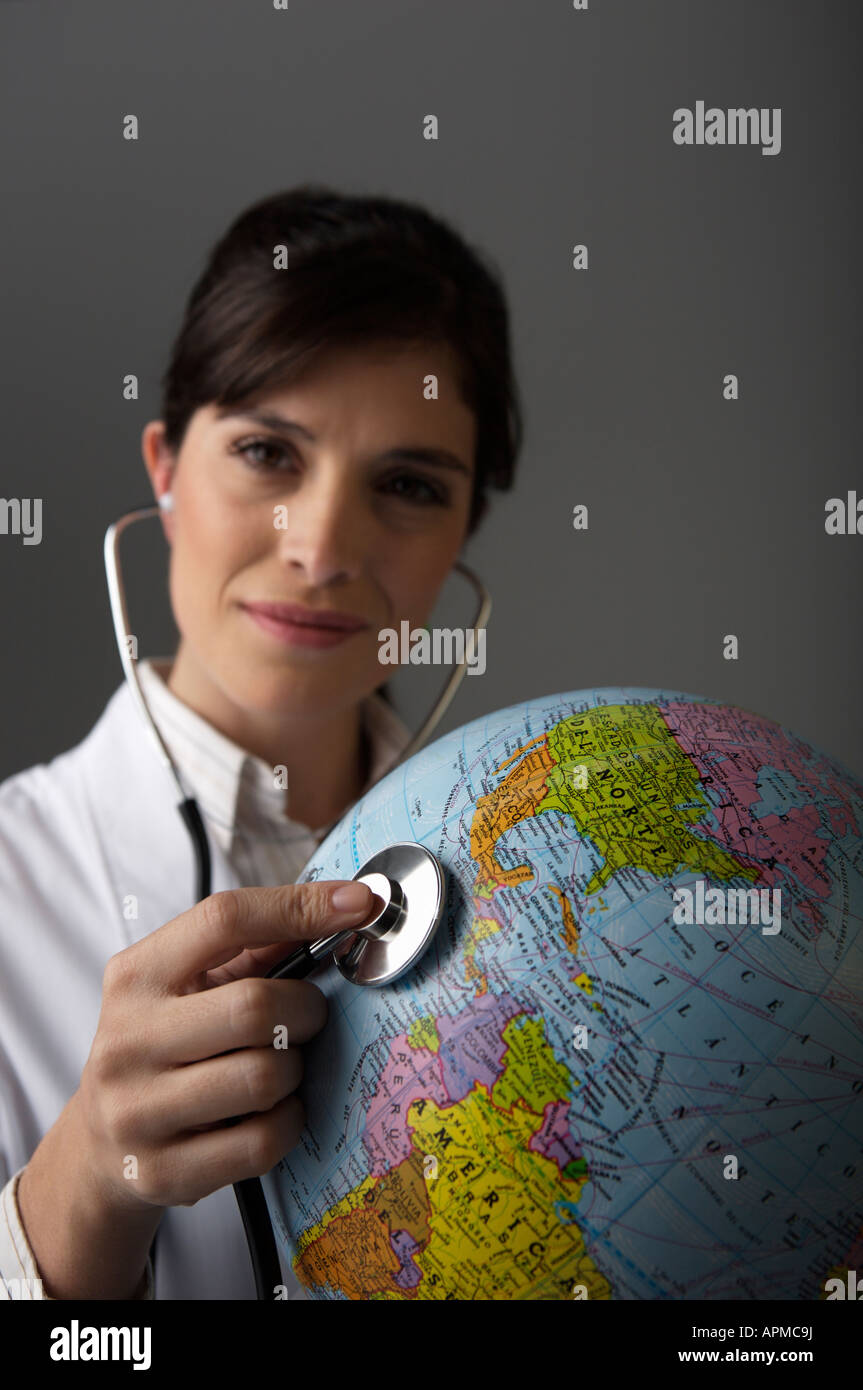 Woman doctor caring the world Stock Photo - Alamy