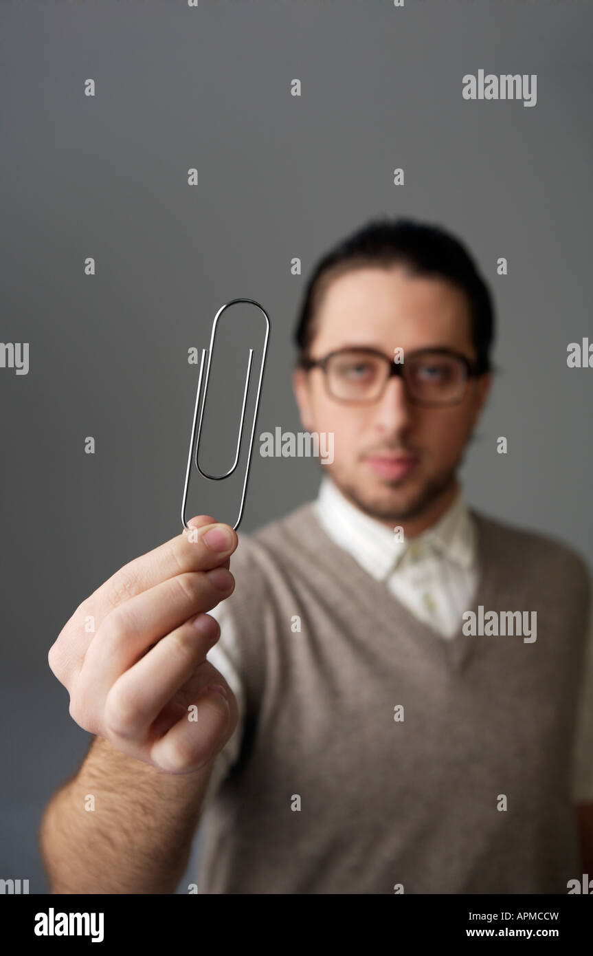 Man holding a clip Stock Photo - Alamy
