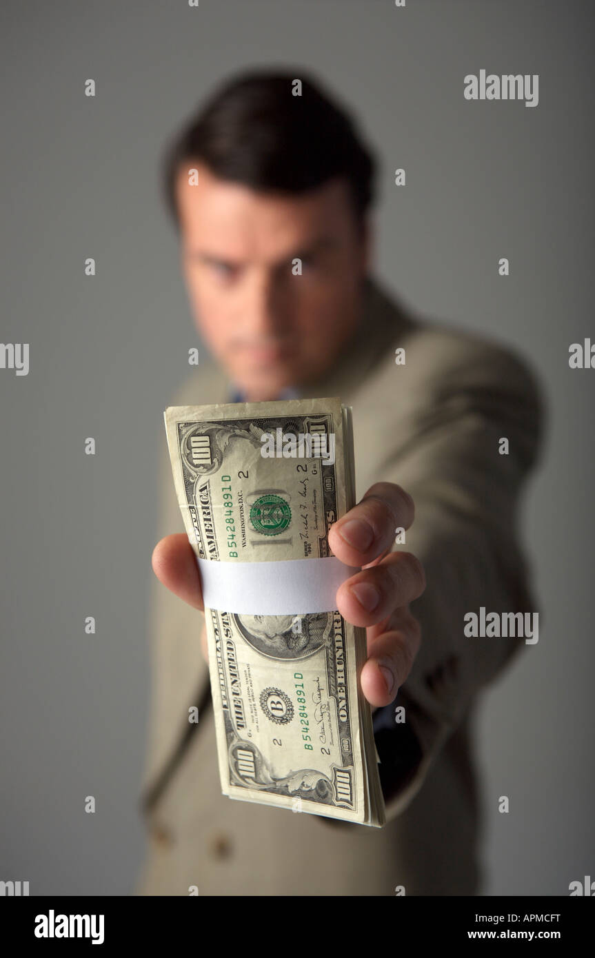 American man holding dollar bill hi-res stock photography and images ...