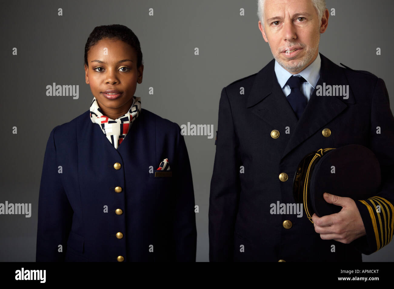 Pilot and stewardess Stock Photo - Alamy
