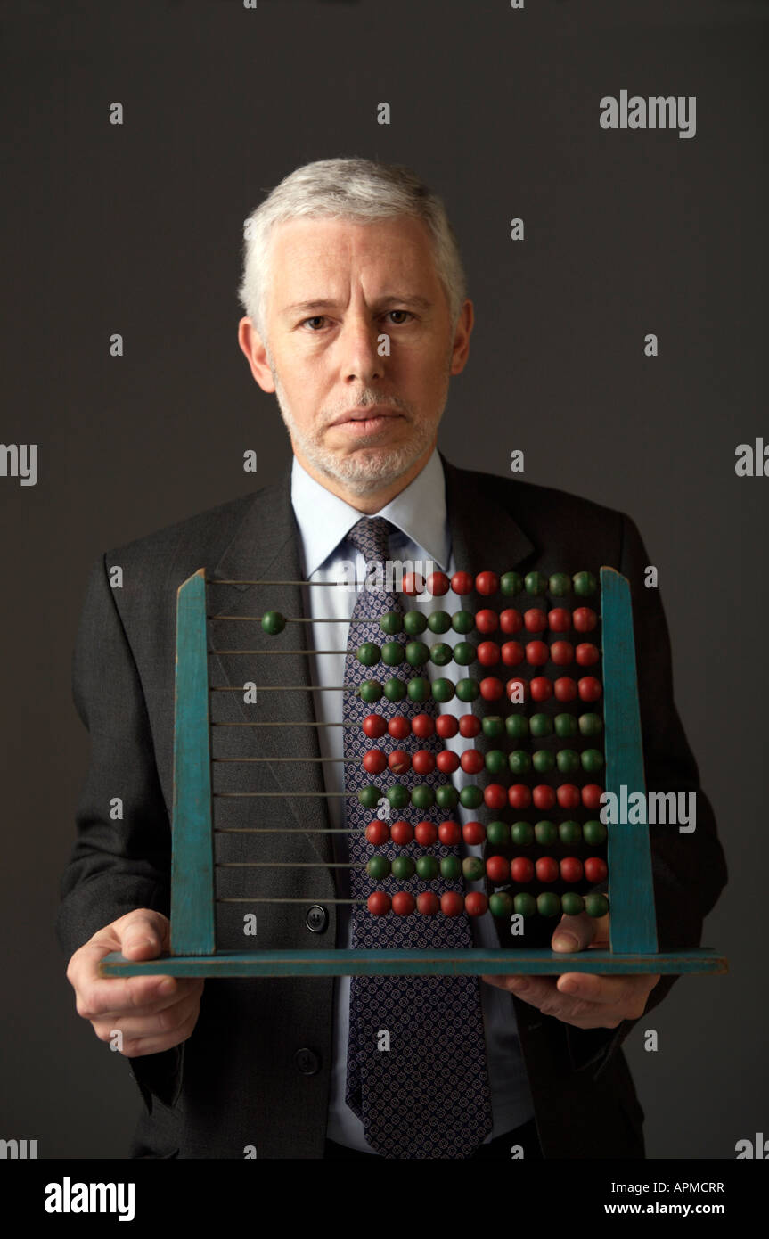 Man holding an Abacus Stock Photo - Alamy