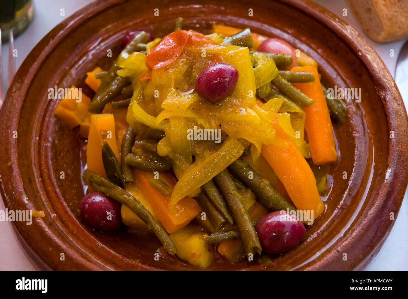 Tajine typical Moroccan dish with stewed meat and vegetables Stock ...