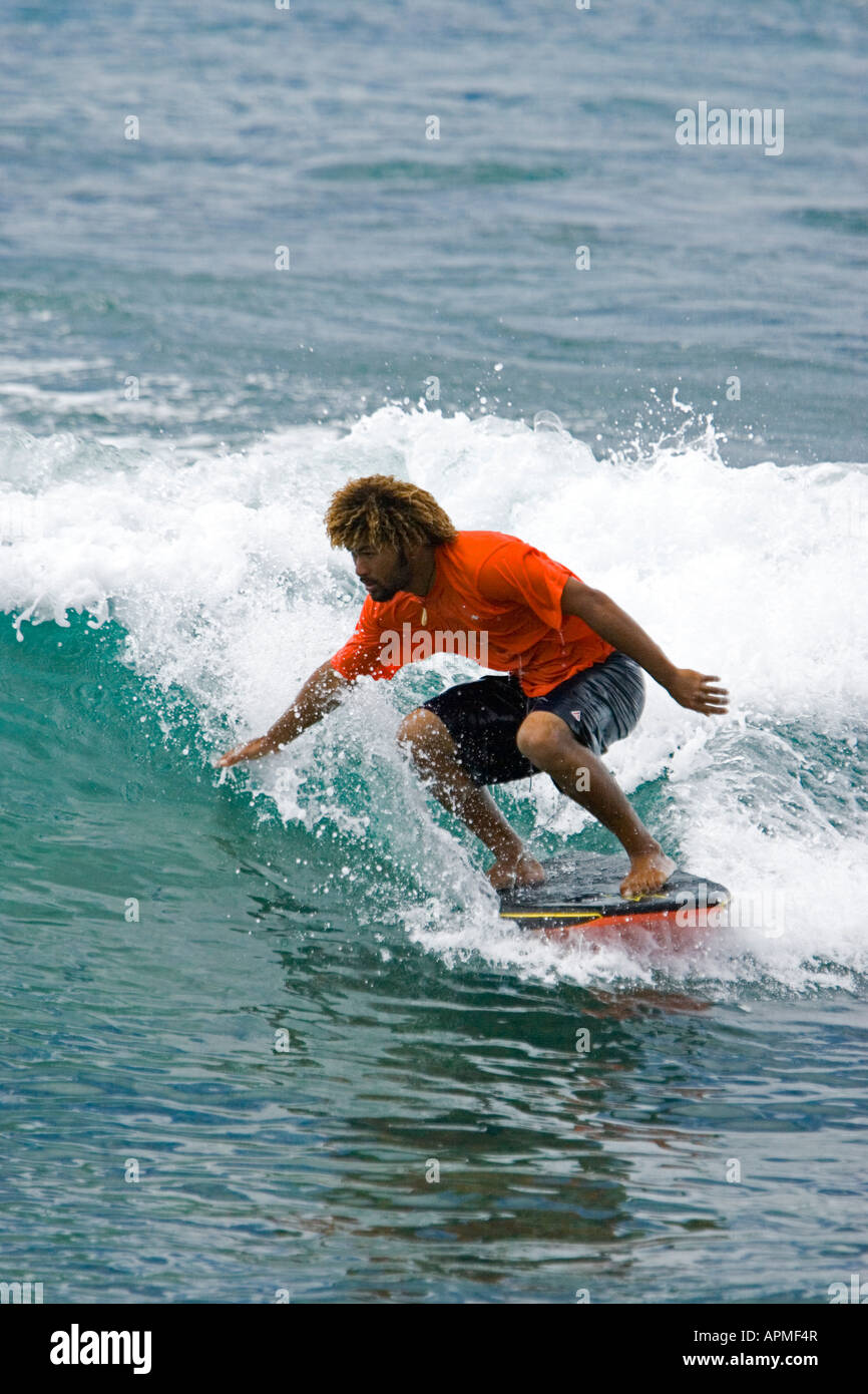 Wave rider in surf Waikiki Beach Honolulu Hawaii USA Stock Photo - Alamy