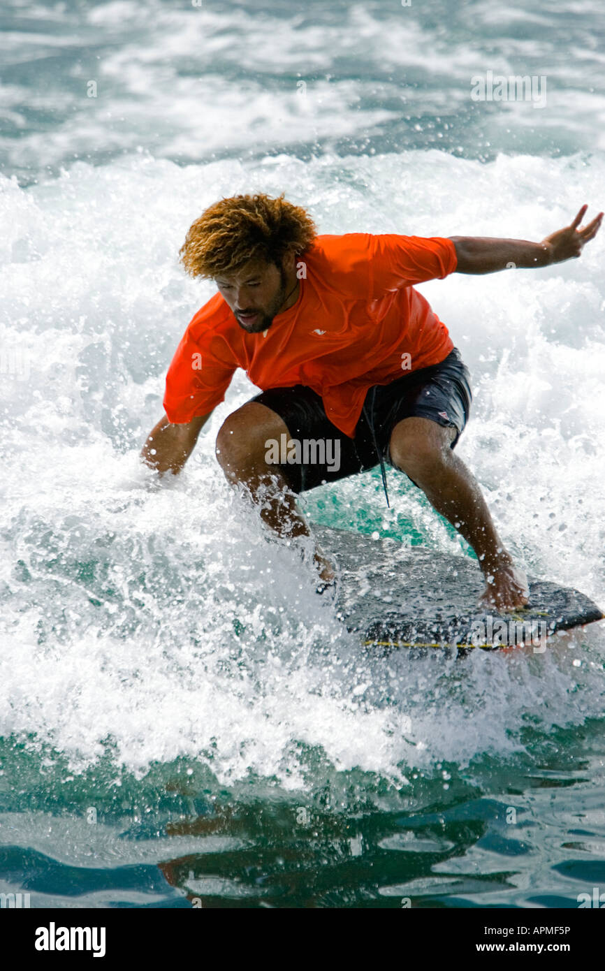 Wave rider in surf Waikiki Beach Honolulu Hawaii USA Stock Photo - Alamy