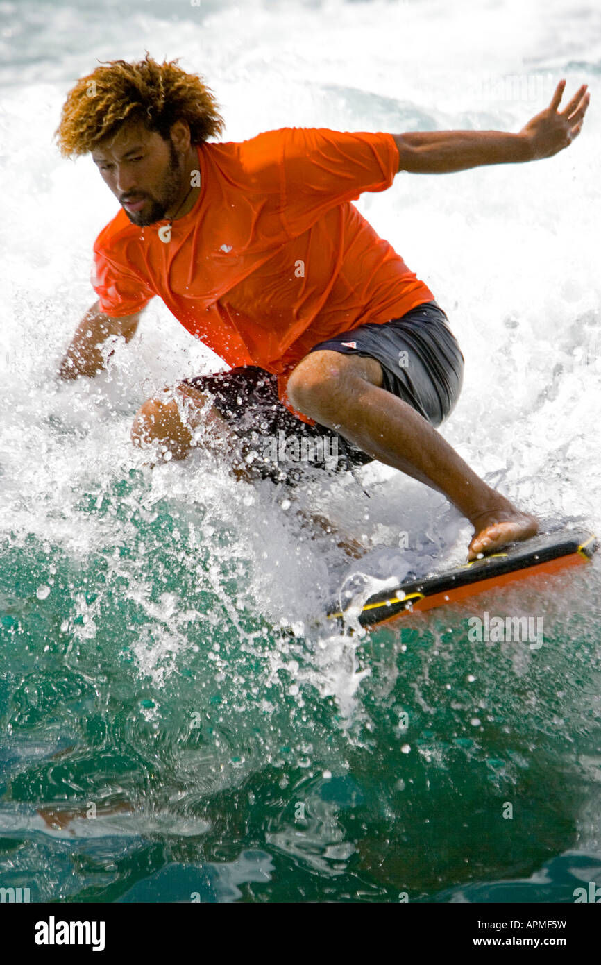Wave rider in surf Waikiki Beach Honolulu Hawaii USA Stock Photo - Alamy