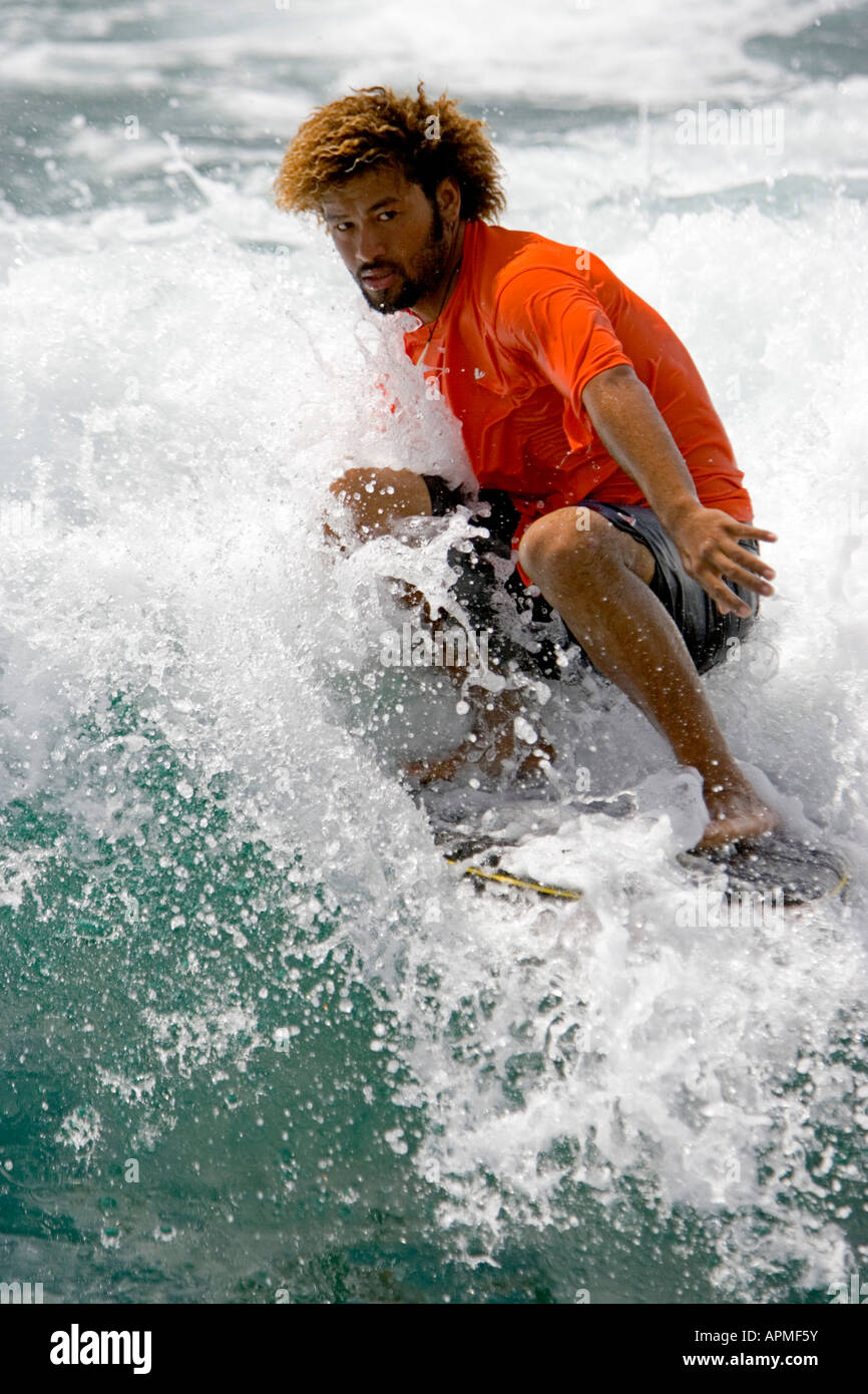 Wave rider in surf Waikiki Beach Honolulu Hawaii USA Stock Photo - Alamy