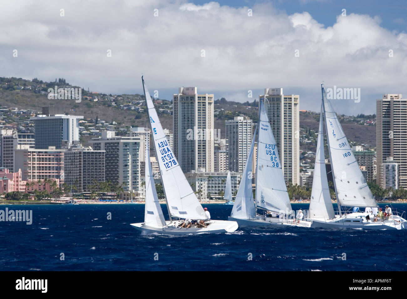 Yacht racing off Waikiki Beach Honolulu Hawaii USA Stock Photo - Alamy