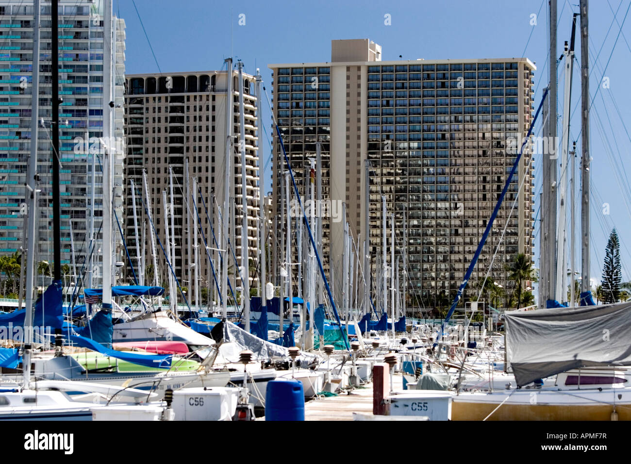 High rise hotels and masts at Ala Wai Boat Harbor Honolulu Hawaii USA ...