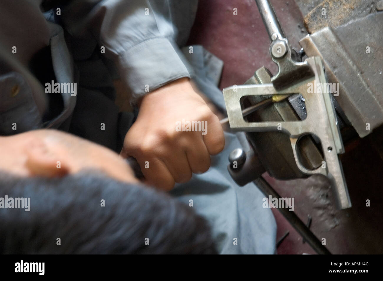 Repairing weapons hi-res stock photography and images - Alamy