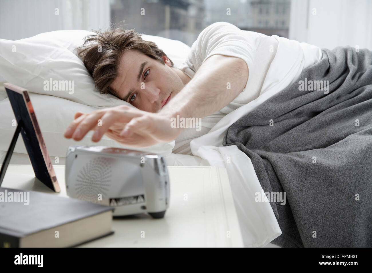 Switching off alarm clock hi-res stock photography and images - Alamy