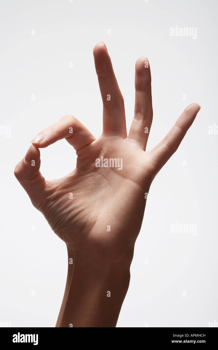 Woman's hand making 'OK' sign (close-up Stock Photo - Alamy