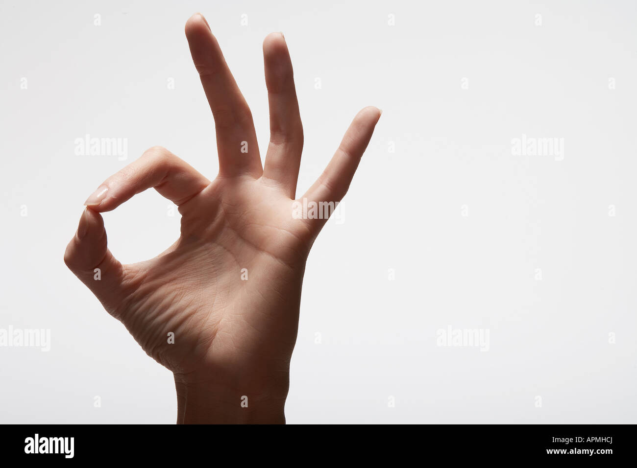 Woman's hand making 'OK' sign (close-up Stock Photo - Alamy