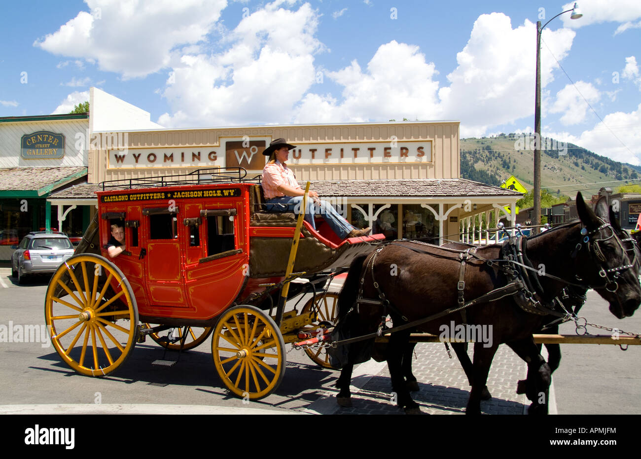 Famous tourist ride on old stage coach around square in the village ...