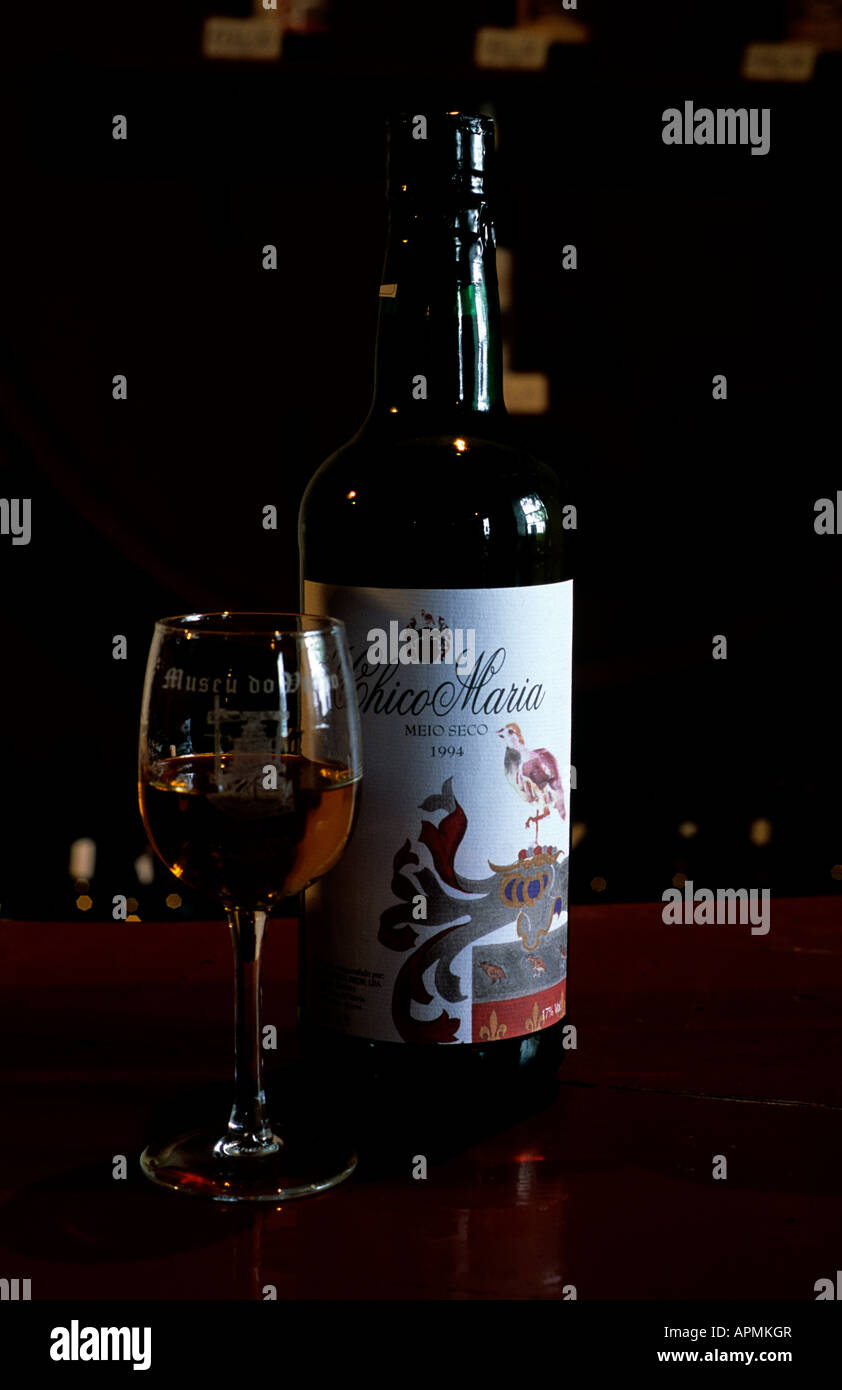 A bottle of Chico Maria wine and a glass, from the Casa Agrícola Brum ...