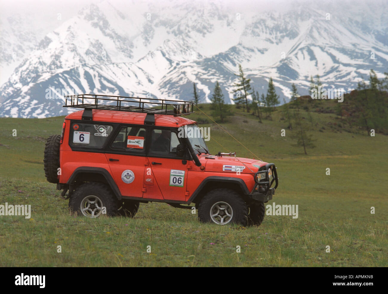 Off-road vehicle Mitsubishi UAZ in the Kurai Steppe. North-Chuya Range ...