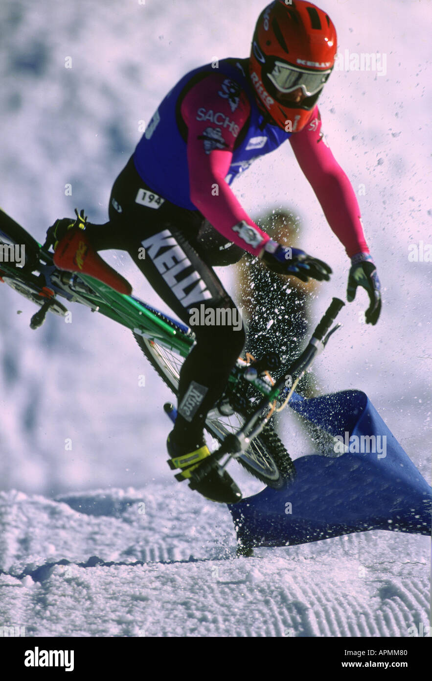 SNOW MOUNTAIN BIKING ACTION Stock Photo - Alamy