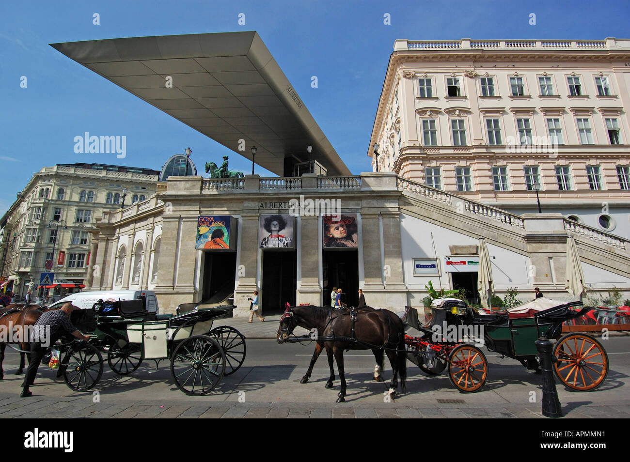 Albertina gallery museum and horse carriages Vienna Austria Stock Photo ...