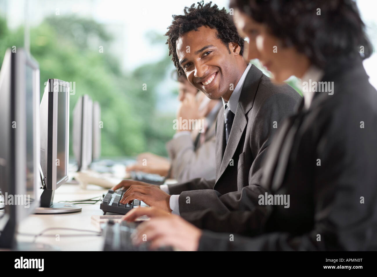 Office workers using computers Stock Photo - Alamy Office workers using computers Stock Photo - Alamy